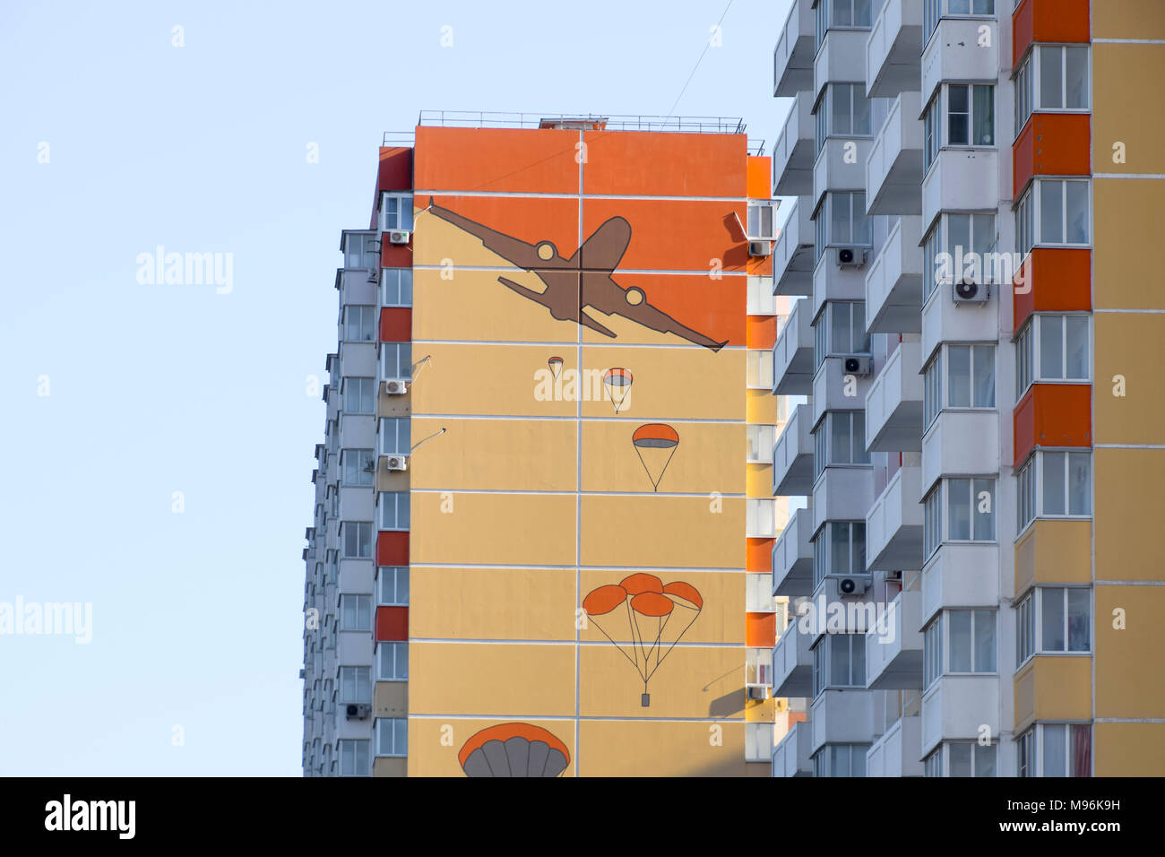 A multi-storey house with a painted wall. Figure depicting the landing ...