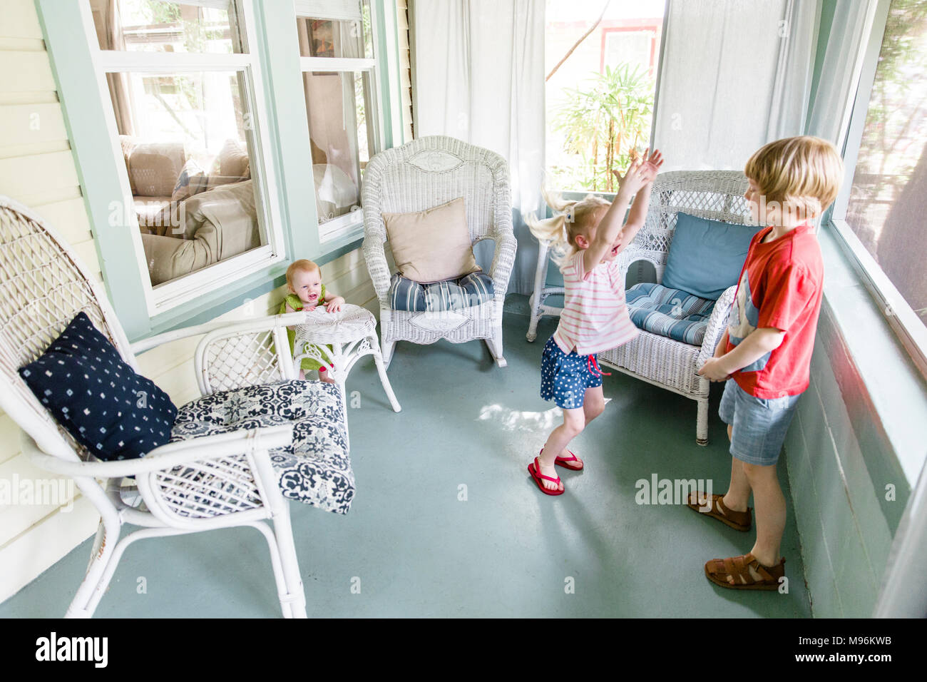 Blonde children playing outside hi-res stock photography and images - Alamy