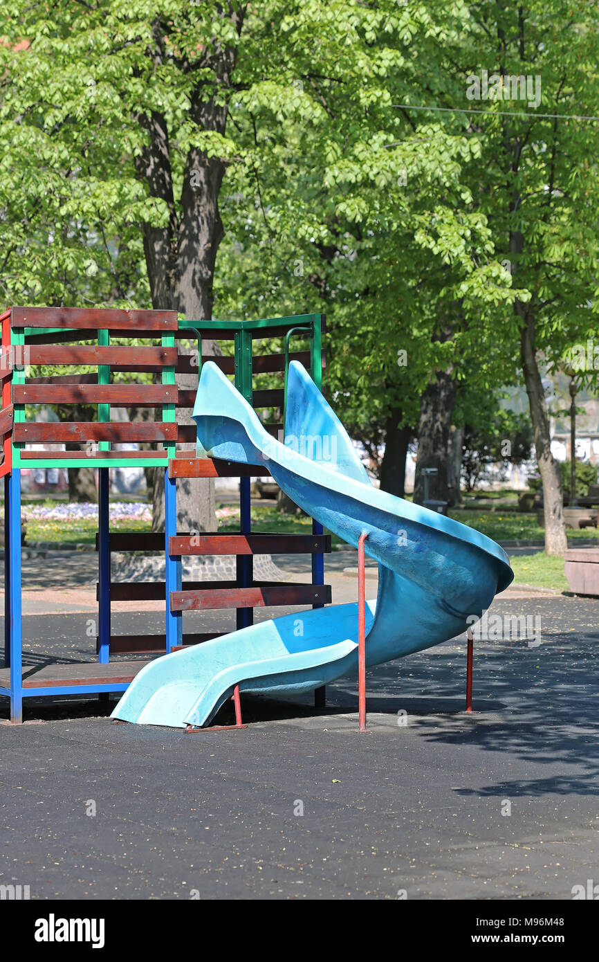 Spiral Playground Slide in Park For Kids Stock Photo - Alamy