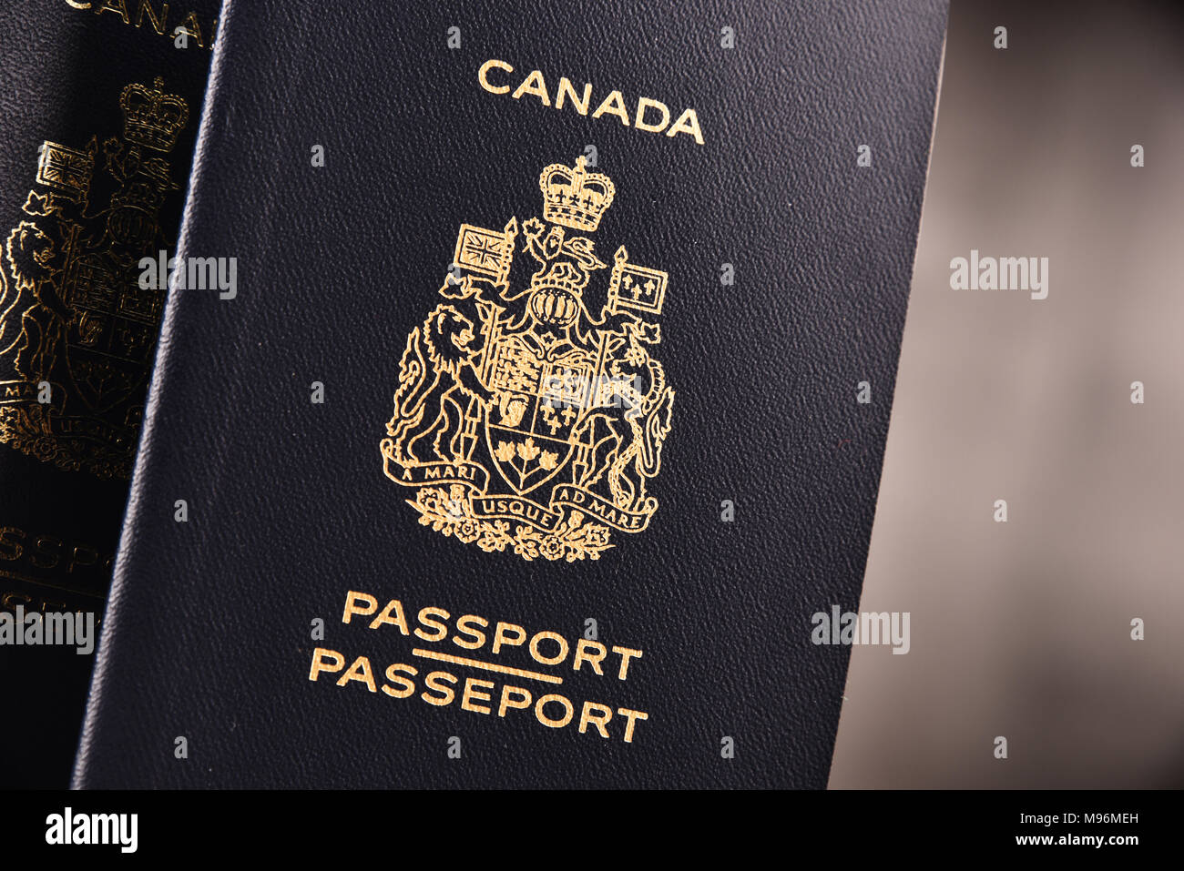 Composition with two Canadian passports Stock Photo - Alamy