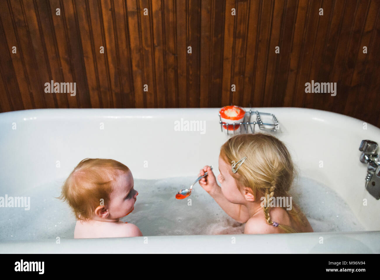 Siblings bathing together hi-res stock photography and images - Alamy