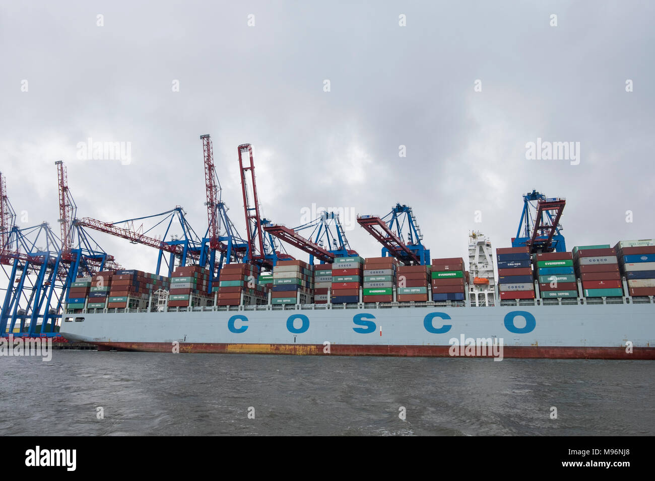 An ocean going container ship in the port of Hamburg Stock Photo - Alamy