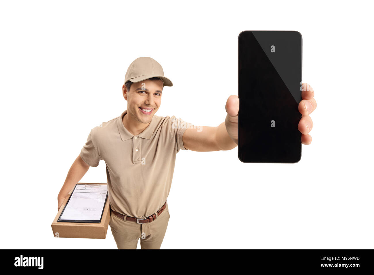 Delivery man showing a phone isolated on white background Stock Photo ...
