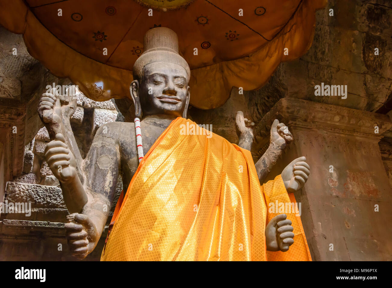 Statue of the Buddha wearing a saffron robe at the UNESCO World ...