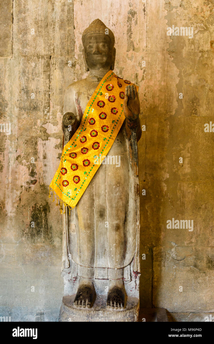 Statue of the Buddha wearing a saffron robe at the UNESCO World ...