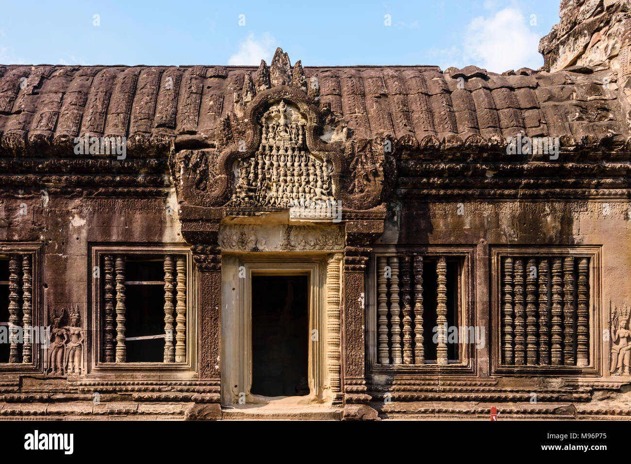 Apsaras (heavenly nymphs) relief bas carvings above a door at the ...