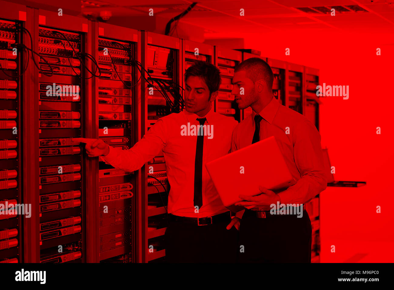 group of young business people it engineer in network server room ...