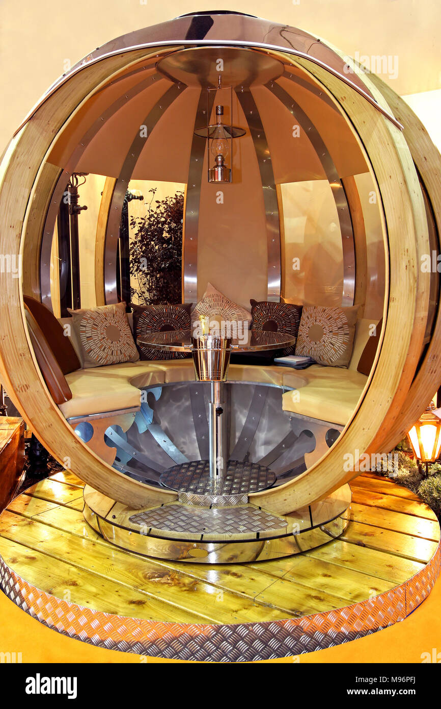 Wooden oval relaxing garden lounge box with champagne bottle Stock ...