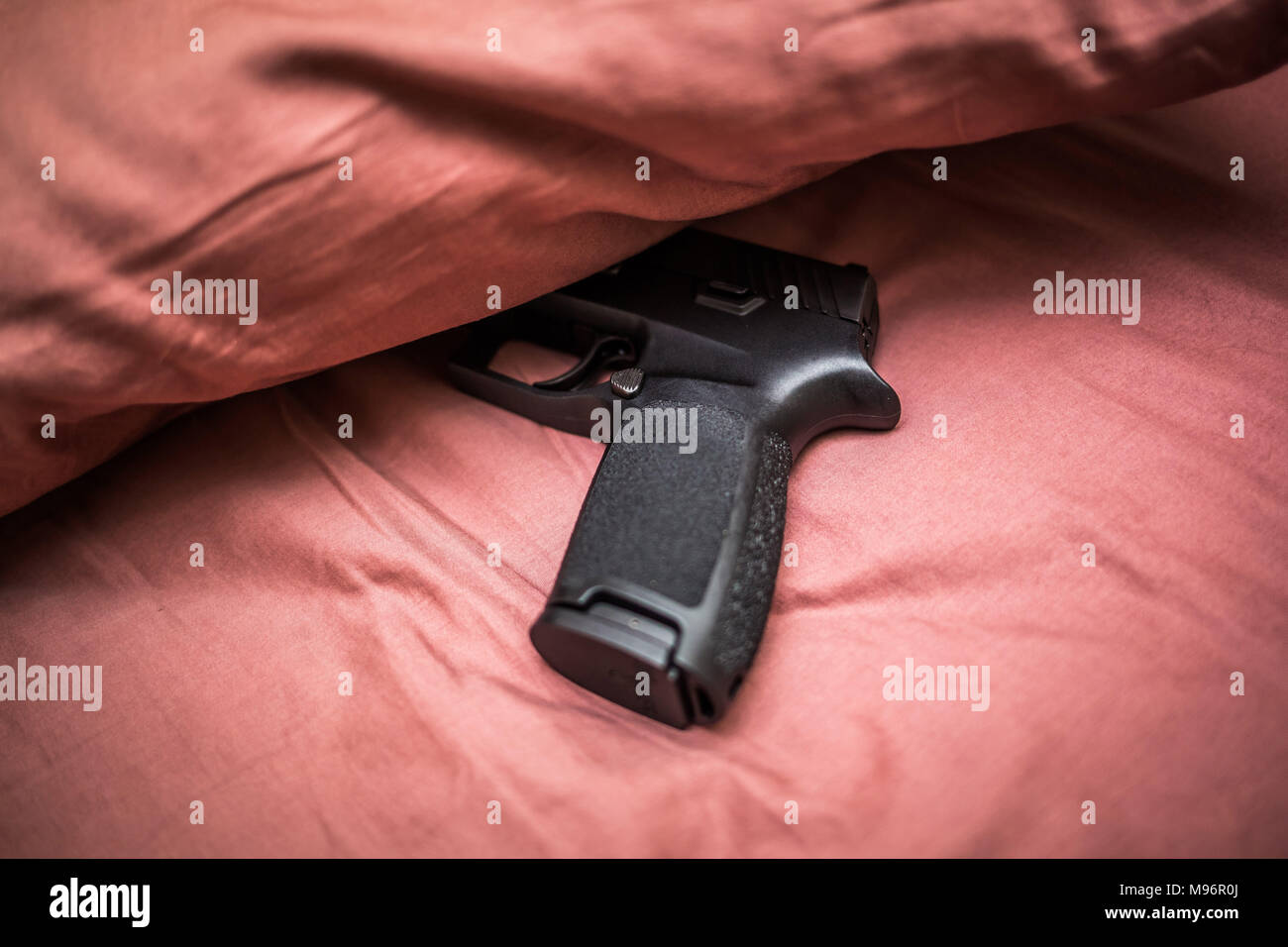 9mm Gun On Bed
