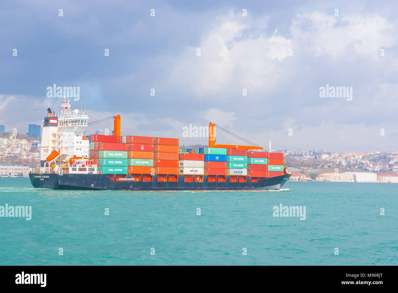 Huge Cargo ship tanker or container passes under 15 July Martyrs Bridge ...