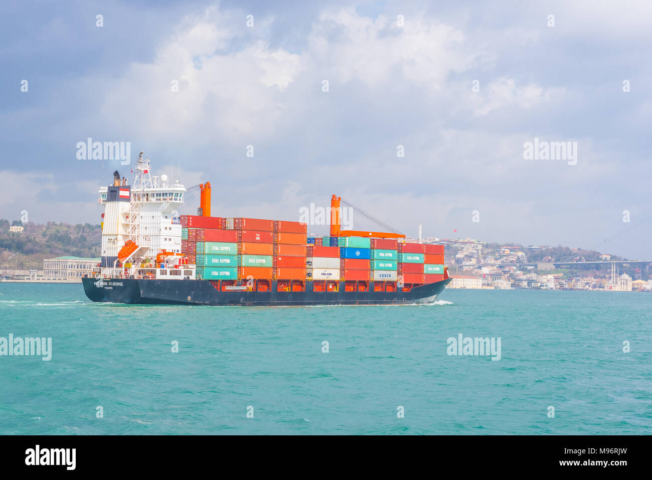 Huge Cargo ship tanker or container passes under 15 July Martyrs Bridge ...