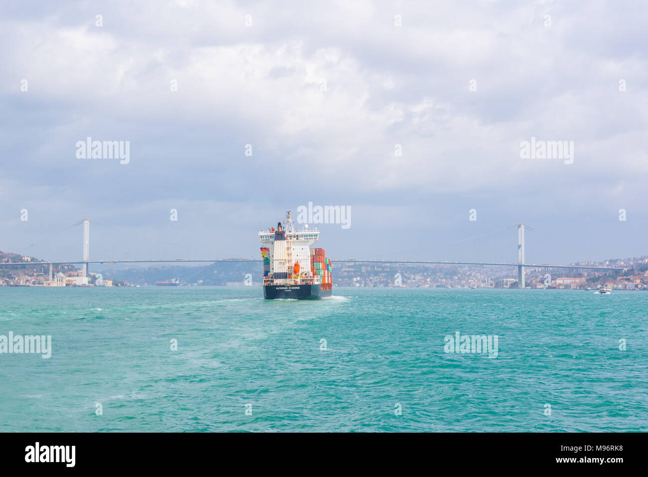 Huge Cargo ship tanker or container passes under 15 July Martyrs Bridge ...