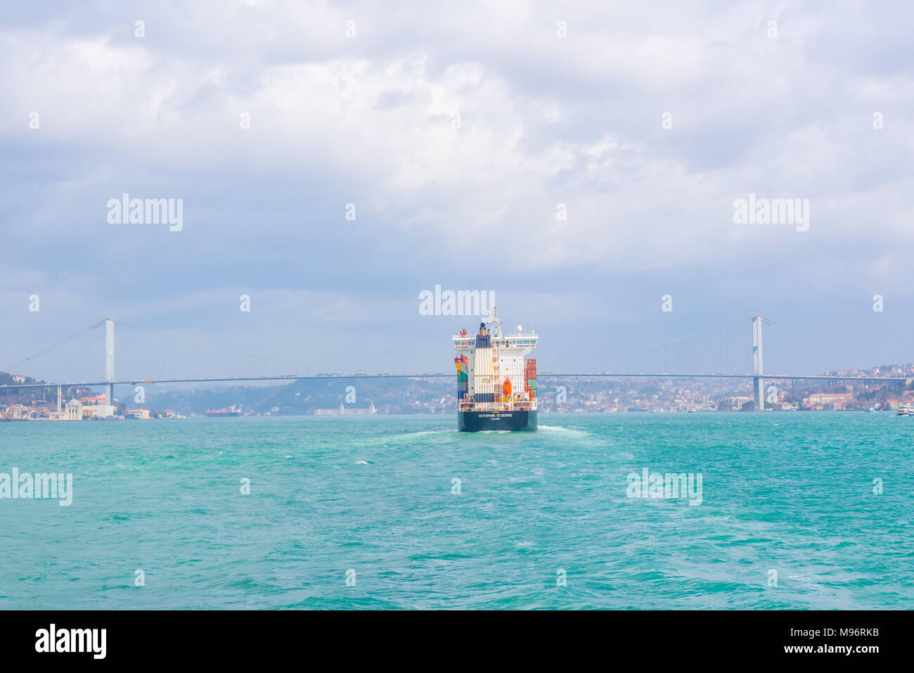 Huge Cargo ship tanker or container passes under 15 July Martyrs Bridge ...