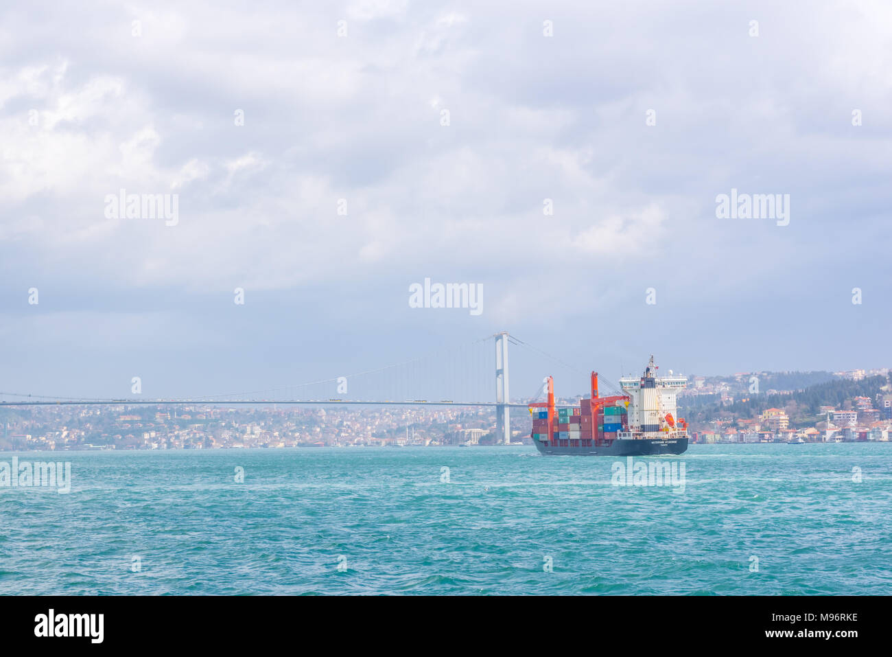 Huge Cargo ship tanker or container passes under 15 July Martyrs Bridge ...