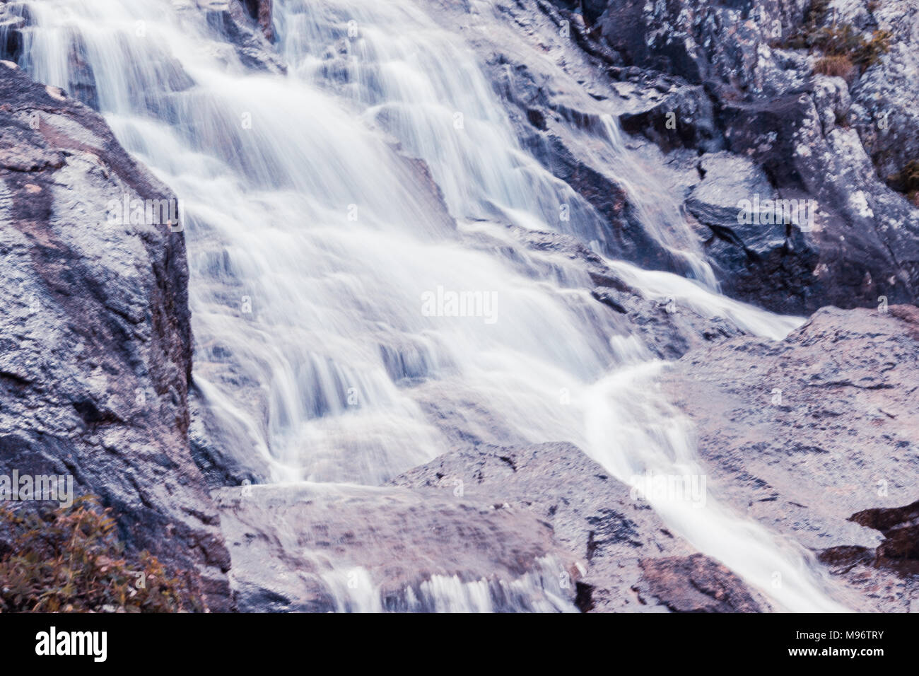 Mountain waterfall on a summer day Stock Photo - Alamy