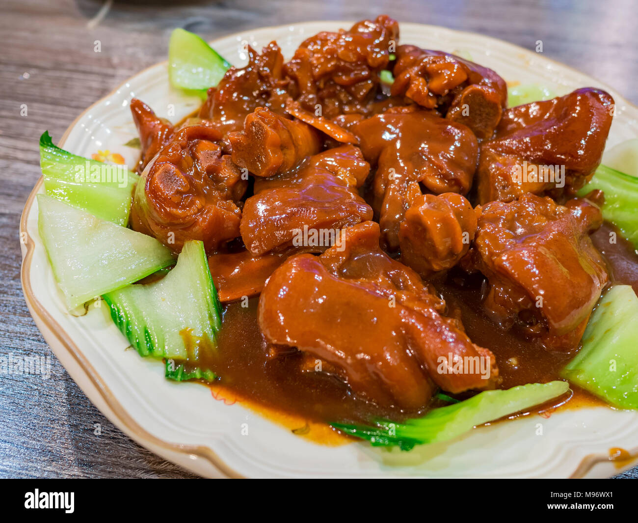 Close up shot of delicious braised pork feet, ate at Los Angeles Stock ...