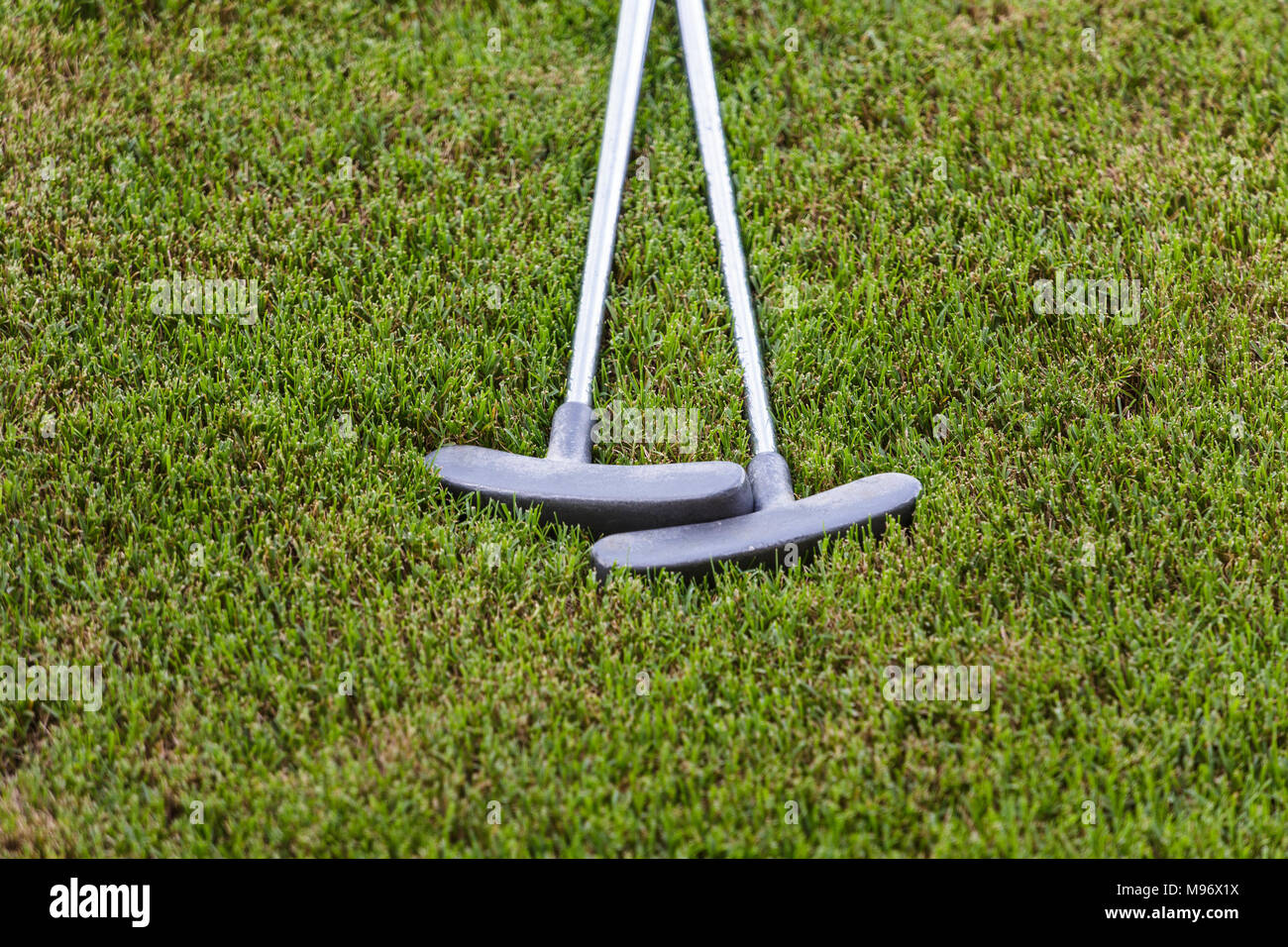 Two putters hi-res stock photography and images - Alamy