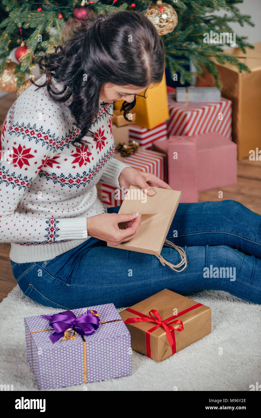 Woman unpacking gifts hi-res stock photography and images - Alamy