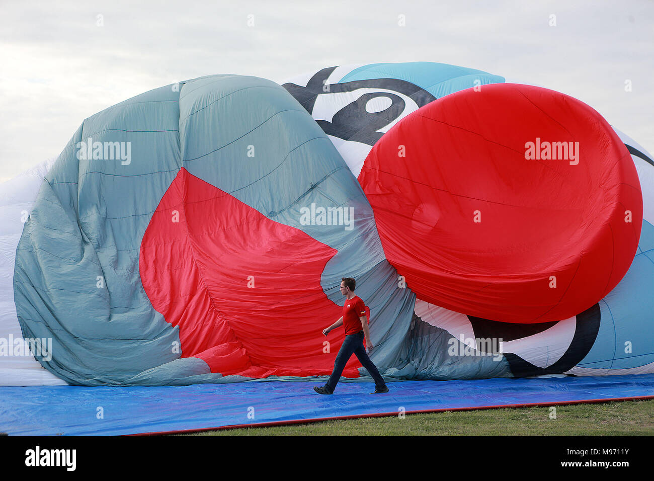 Pampanga, Philippines. 23rd Mar, 2018. An aviator walks in front of a ...