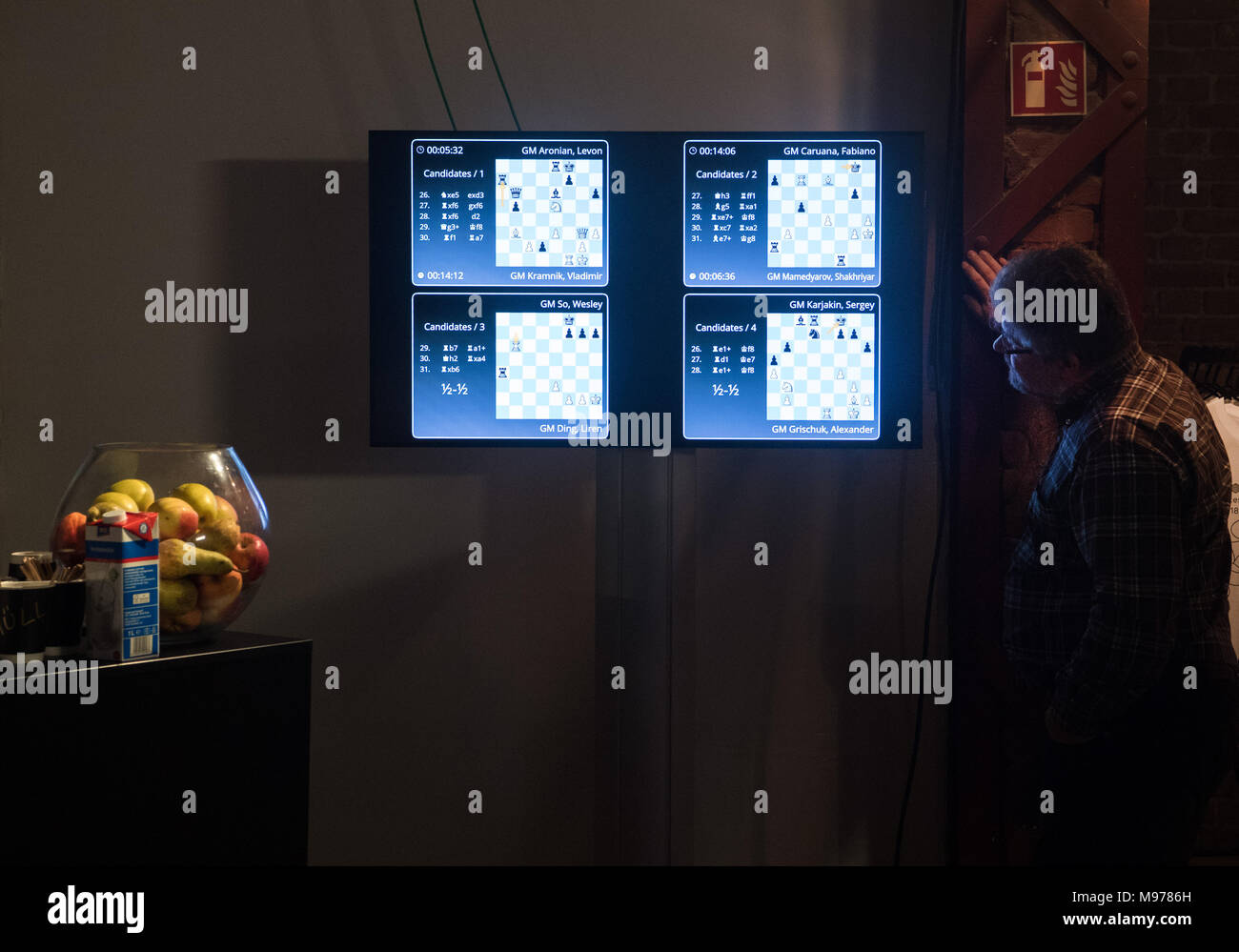 22 March 2018, Germany, Berlin: An audience member watches a game of ...