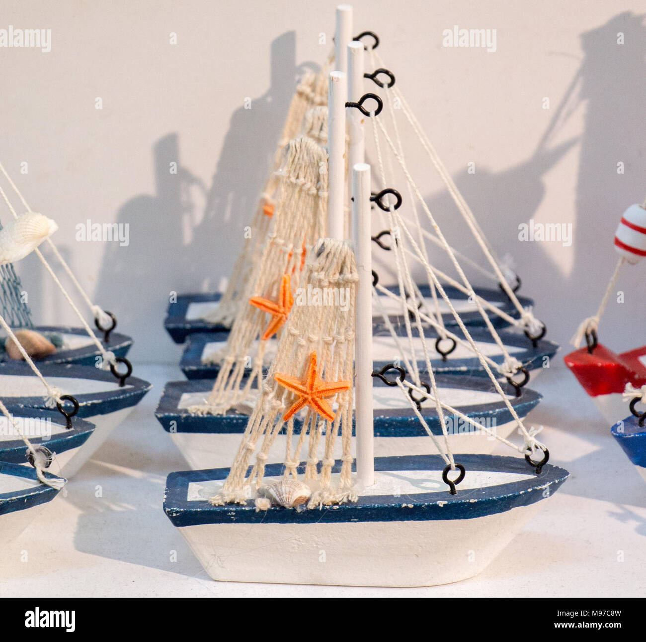 Set of small colorful model boats Stock Photo - Alamy