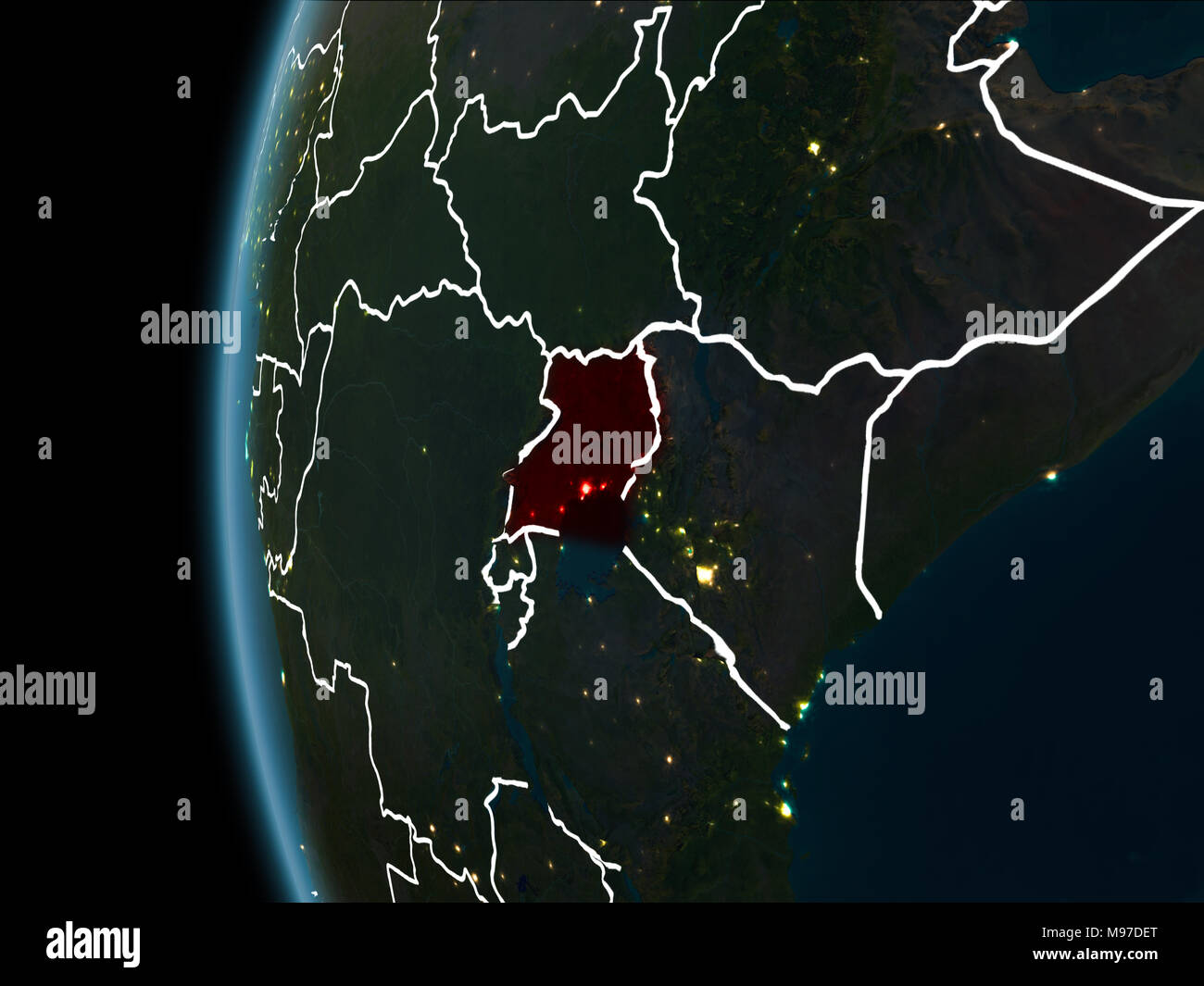 Orbit view of Uganda highlighted in red with visible borderlines and city lights on planet Earth ...