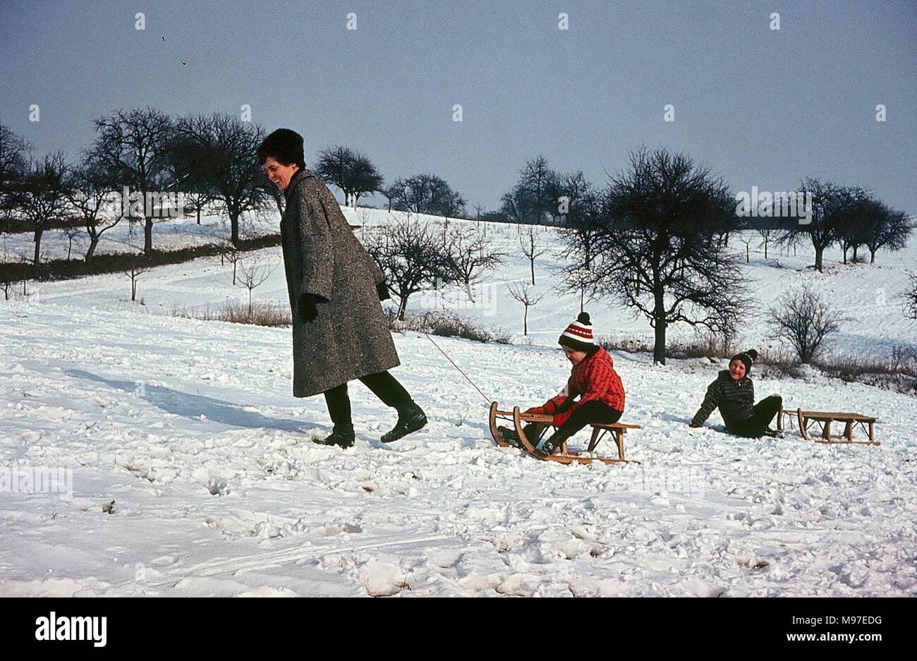 Sinsheim, Germany - Winter 1964: A mother and her children go ...