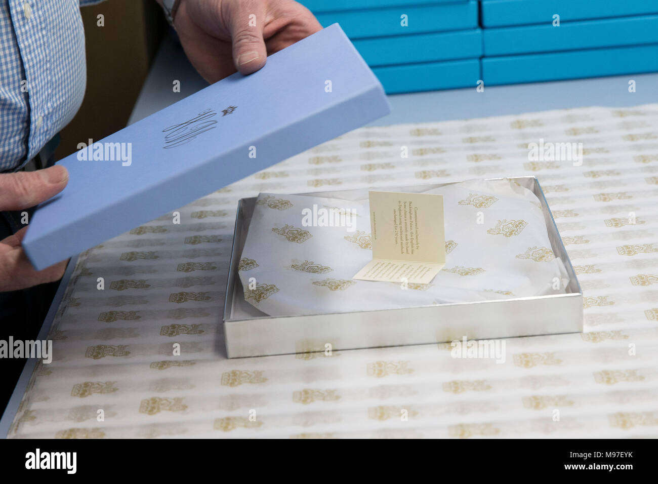 The finishing touches are applied to a commemorative plate box during ...