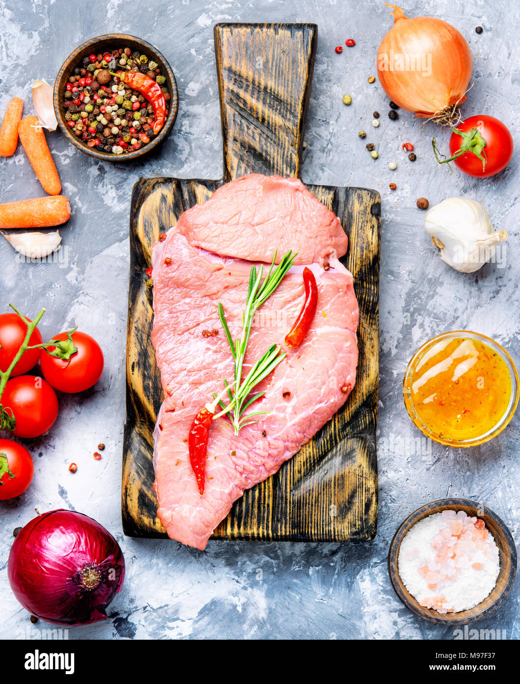 Raw beef fillet steaks with rosemary and spices.Raw meat Stock Photo ...