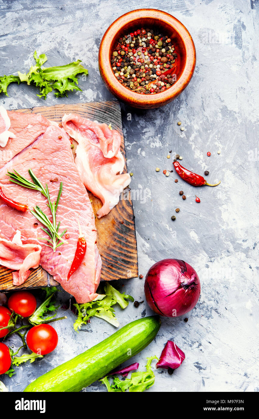 Raw beef fillet steaks with rosemary and spices.Raw meat Stock Photo ...