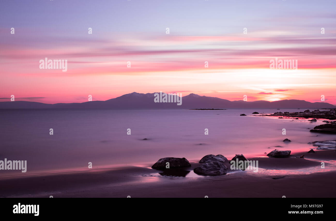 A beautiful sunset over the shoreline to Arran Hills in winter colours ...