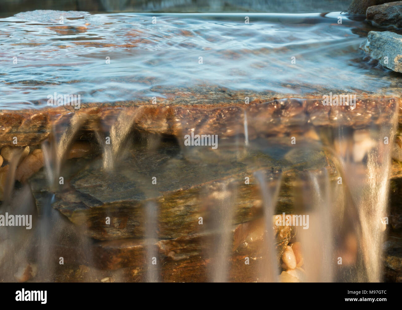 Spilling over rocks hi-res stock photography and images - Alamy