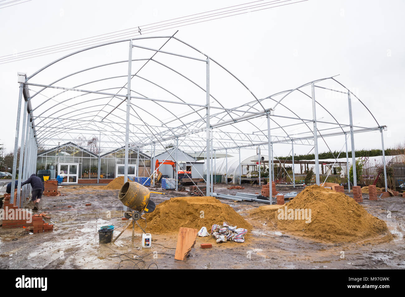 Framework of extension being built at a garden nursery Stock Photo - Alamy