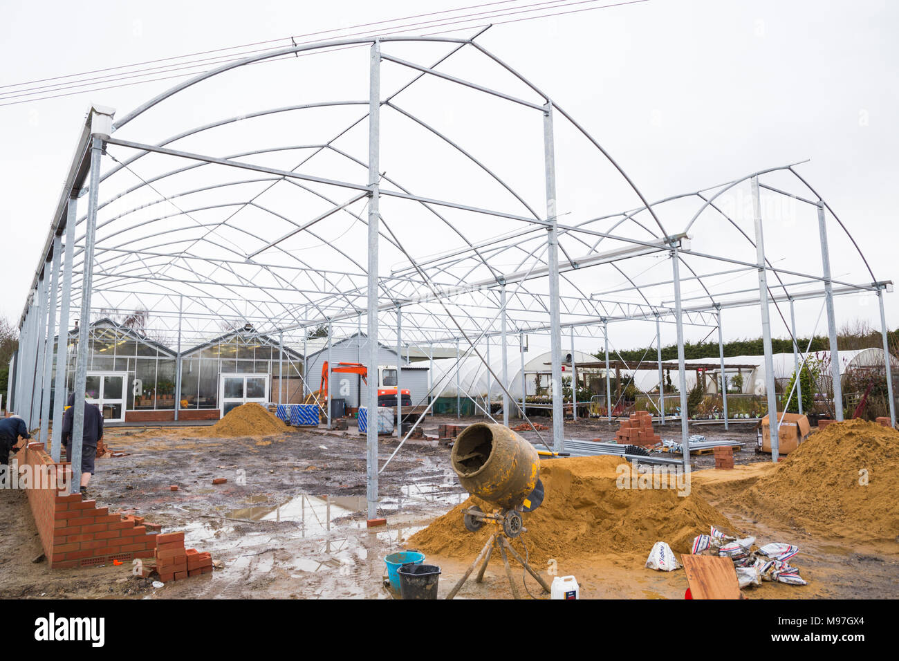 Framework of extension being built at a garden nursery Stock Photo - Alamy