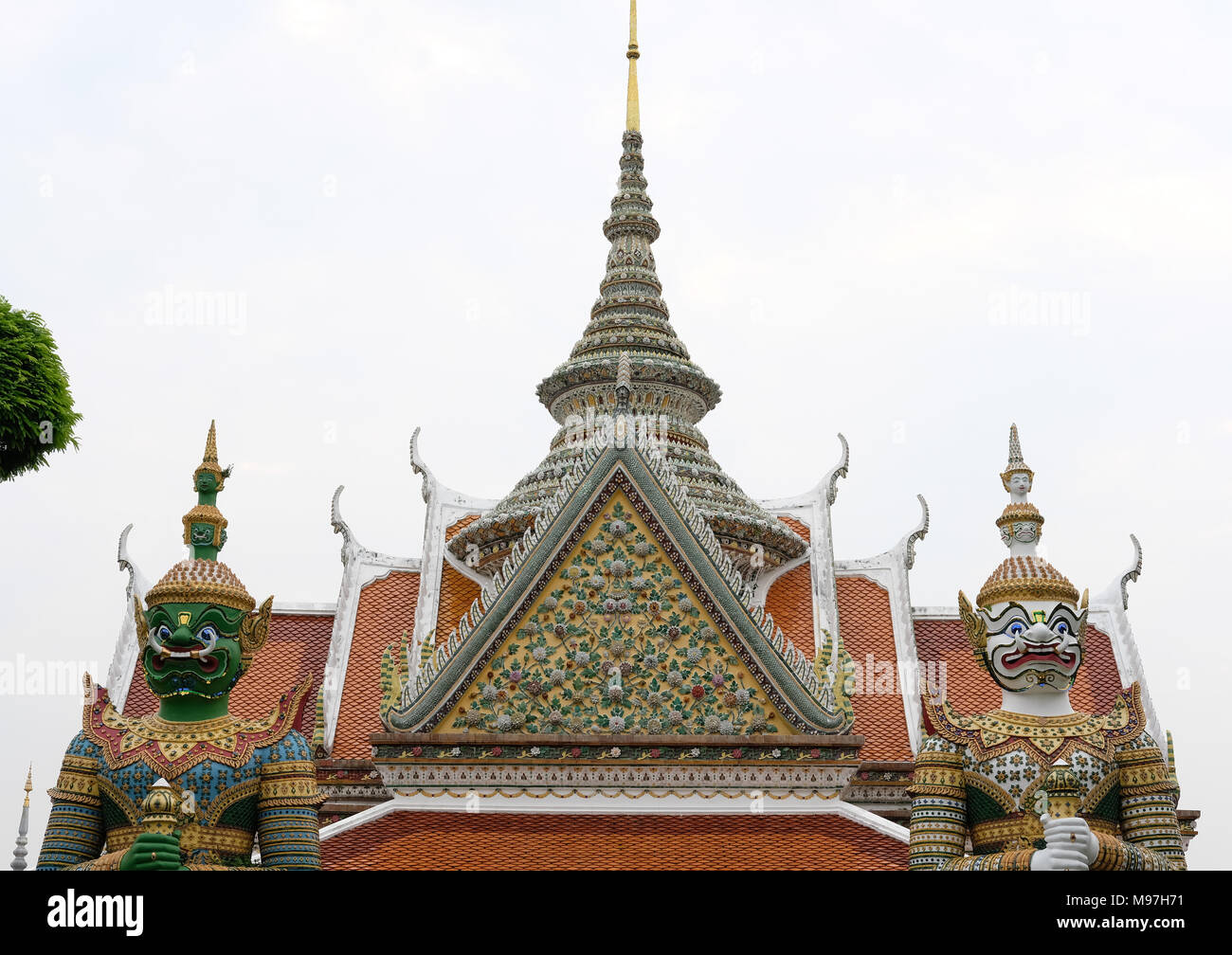 giant statue & sculpture on asian temple. buddhist building encrusted ...