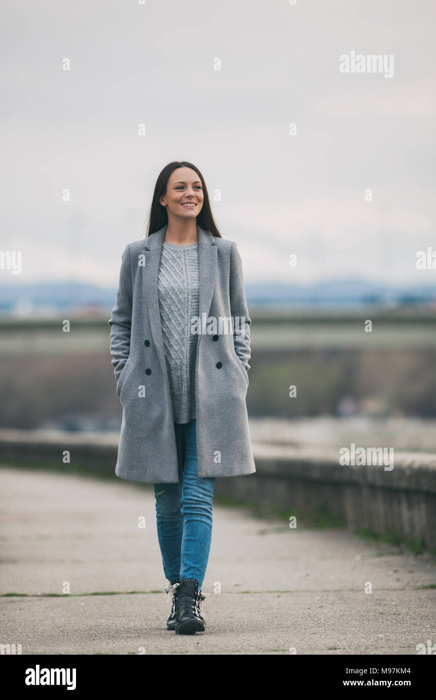 Woman walking to work happy hi-res stock photography and images - Alamy