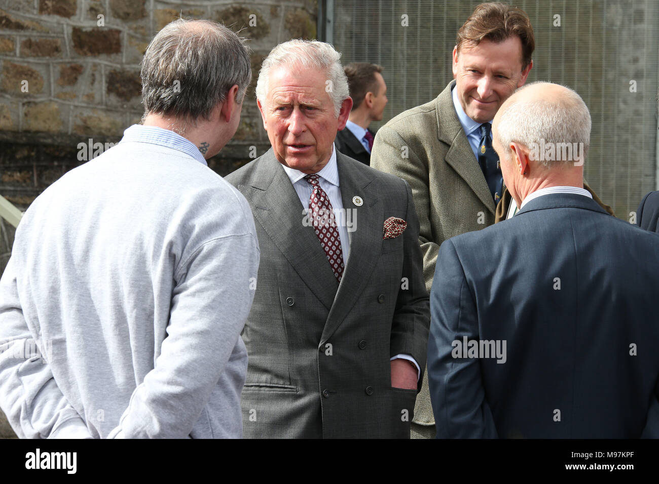 The Prince of Wales talks to one of the inmates (left) involved in the ...