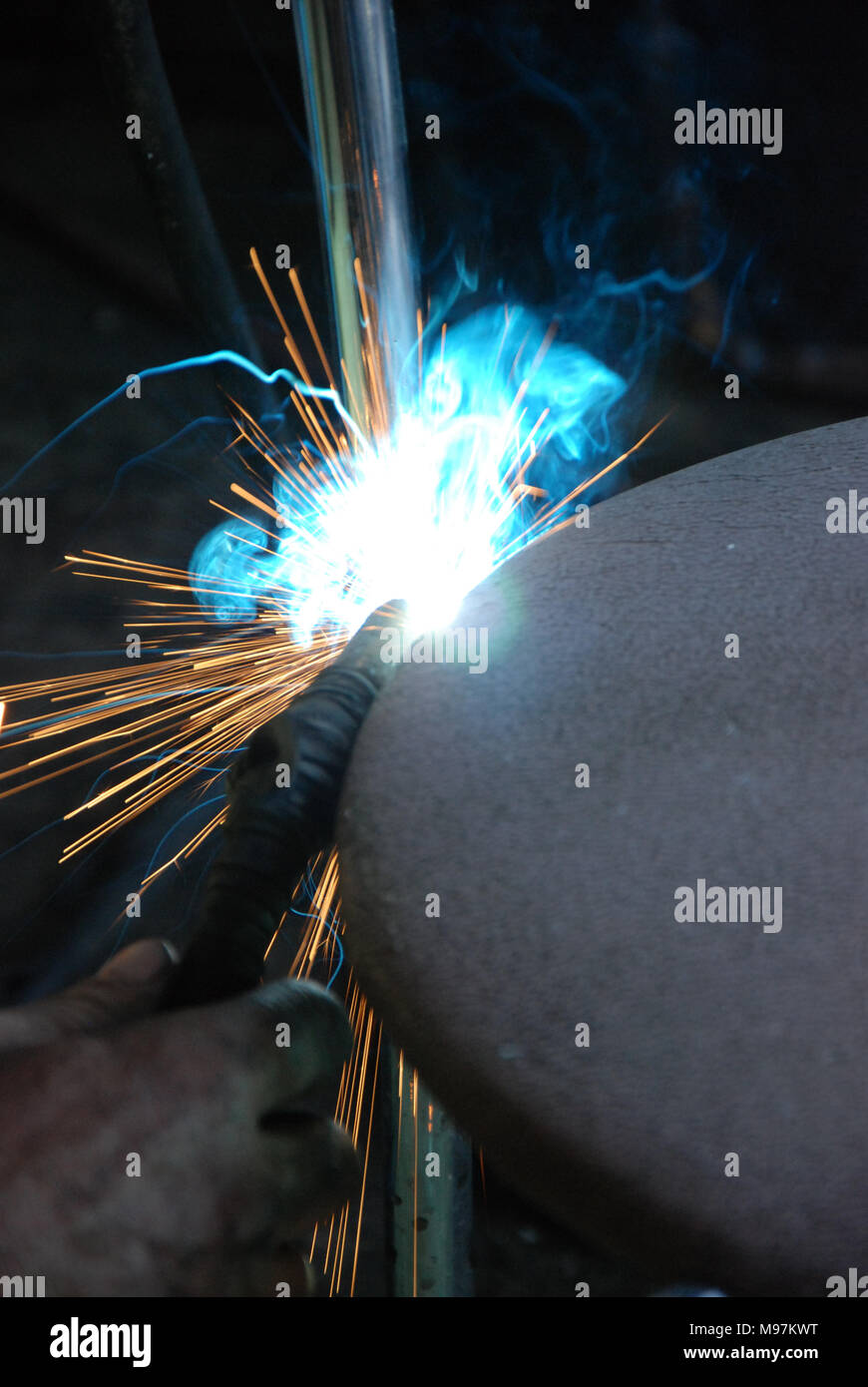picture of a process of welding. sparks and heat Stock Photo - Alamy