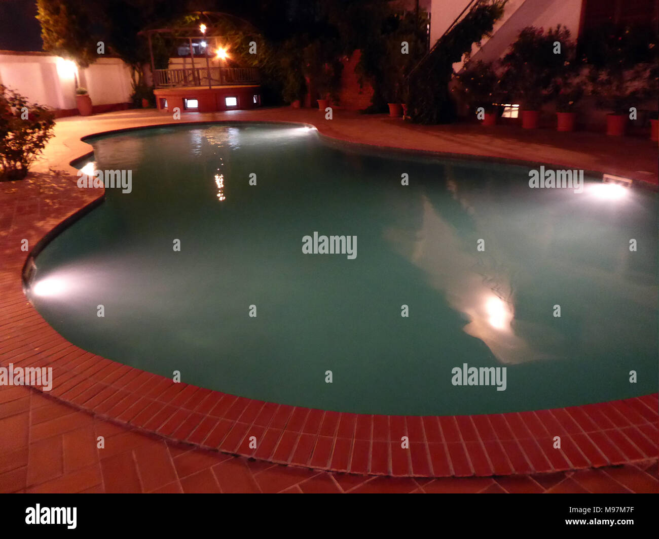 picture of a Swimming pool by night Stock Photo - Alamy