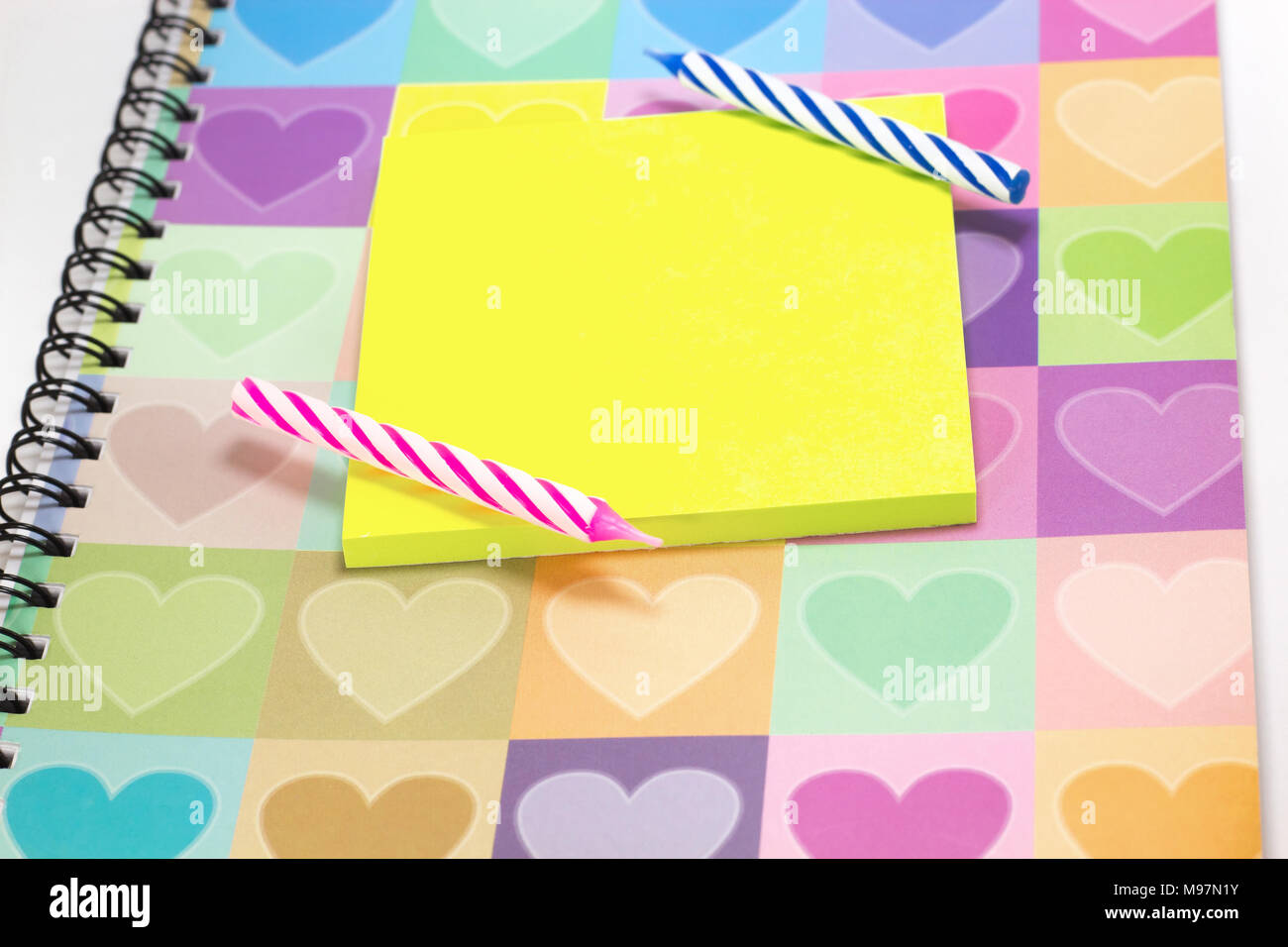 Happy birthday candle and blank notepad with love diary background ...