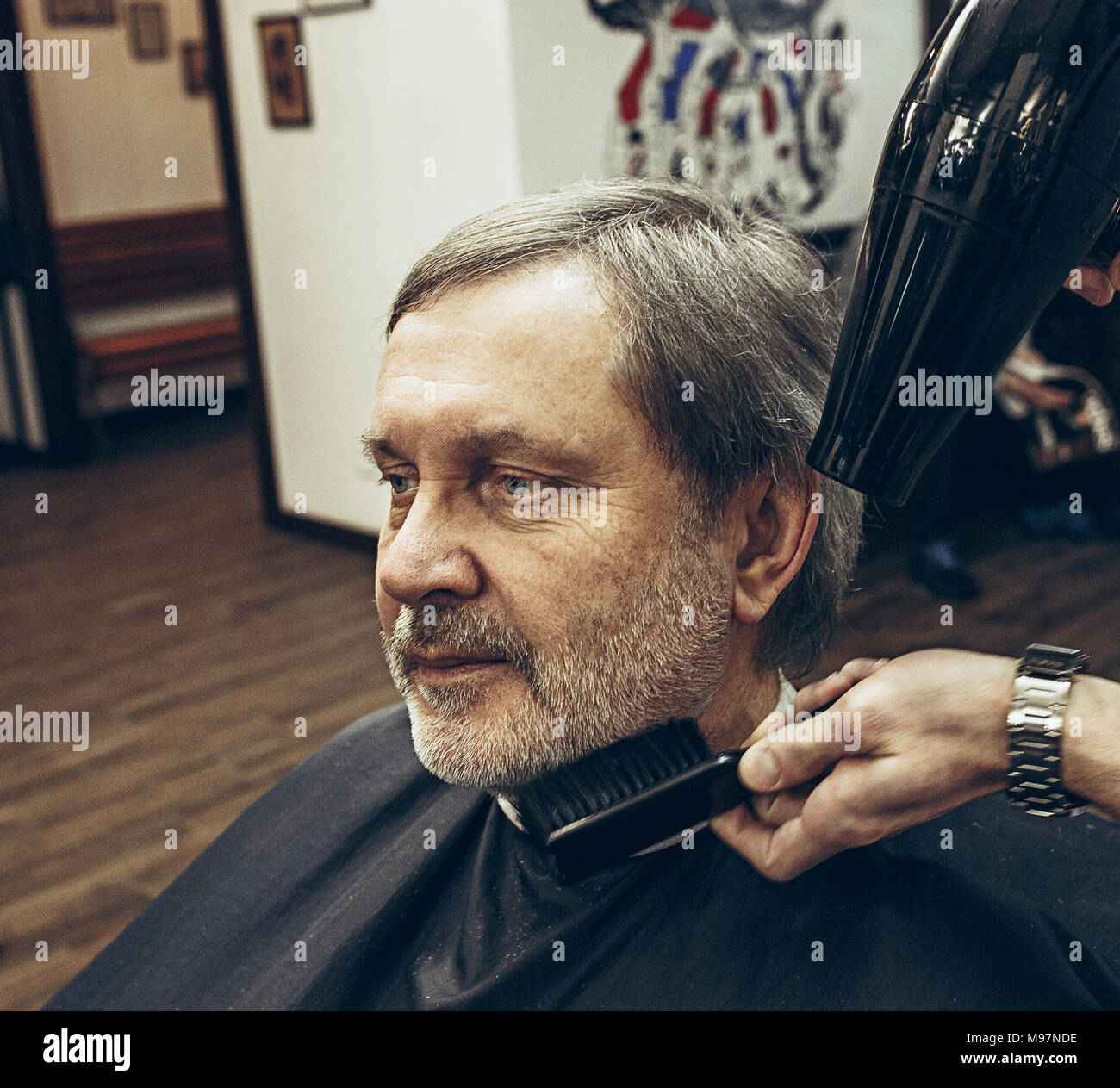 Close-up side view portrait of handsome senior bearded caucasian man ...