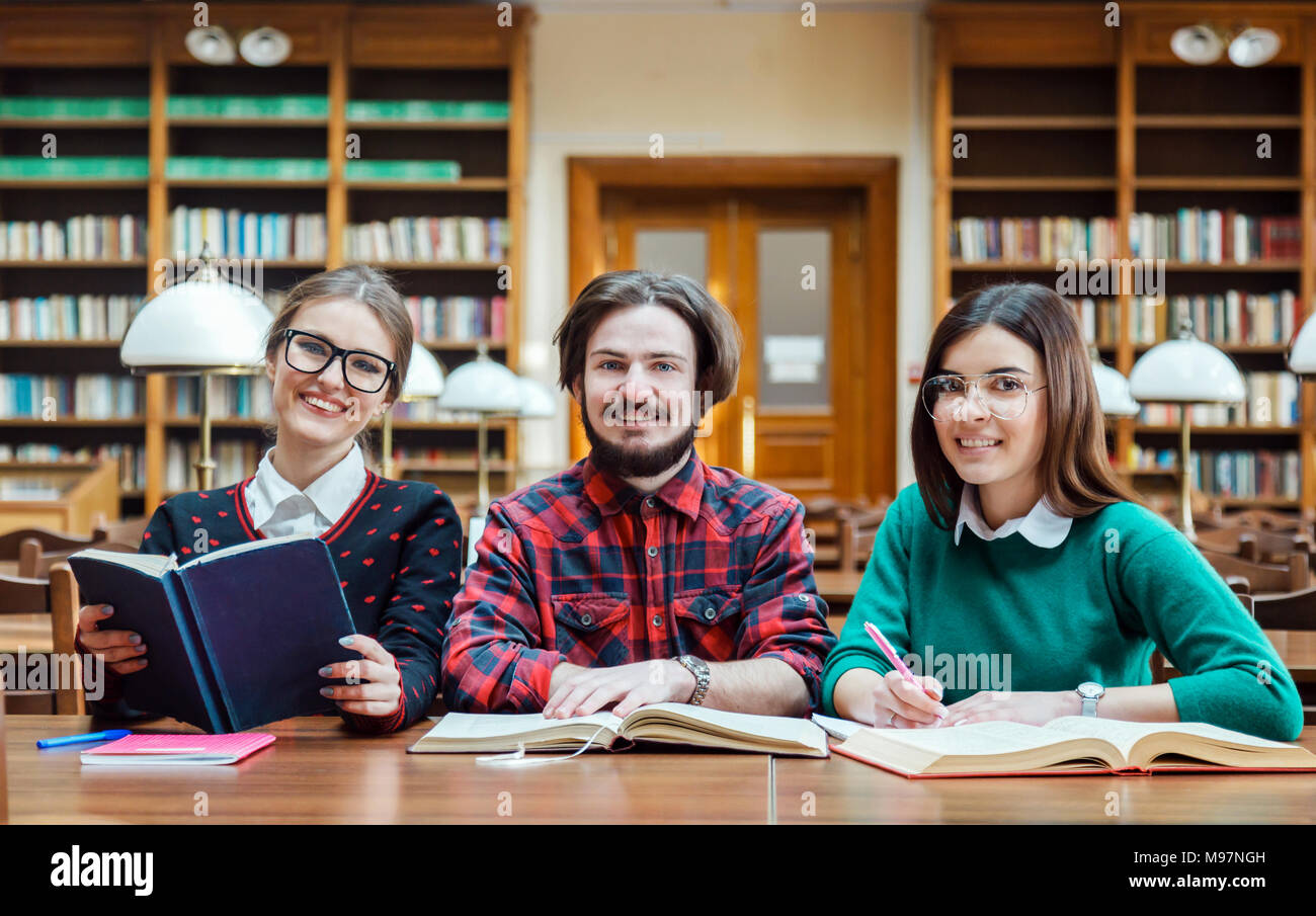 Group of Students in Library Stock Photo - Alamy