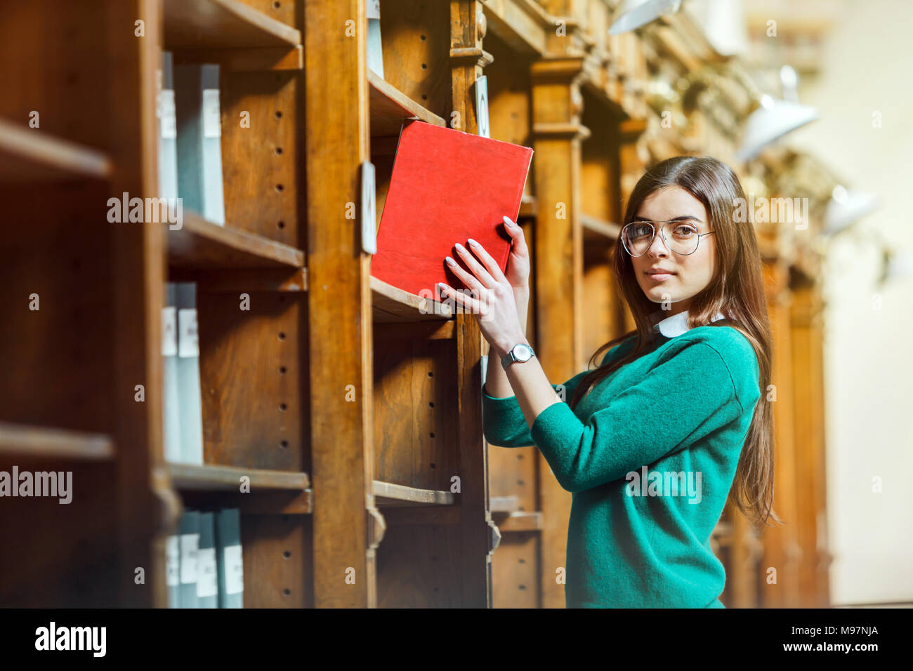 Girl in the Library Stock Photo - Alamy