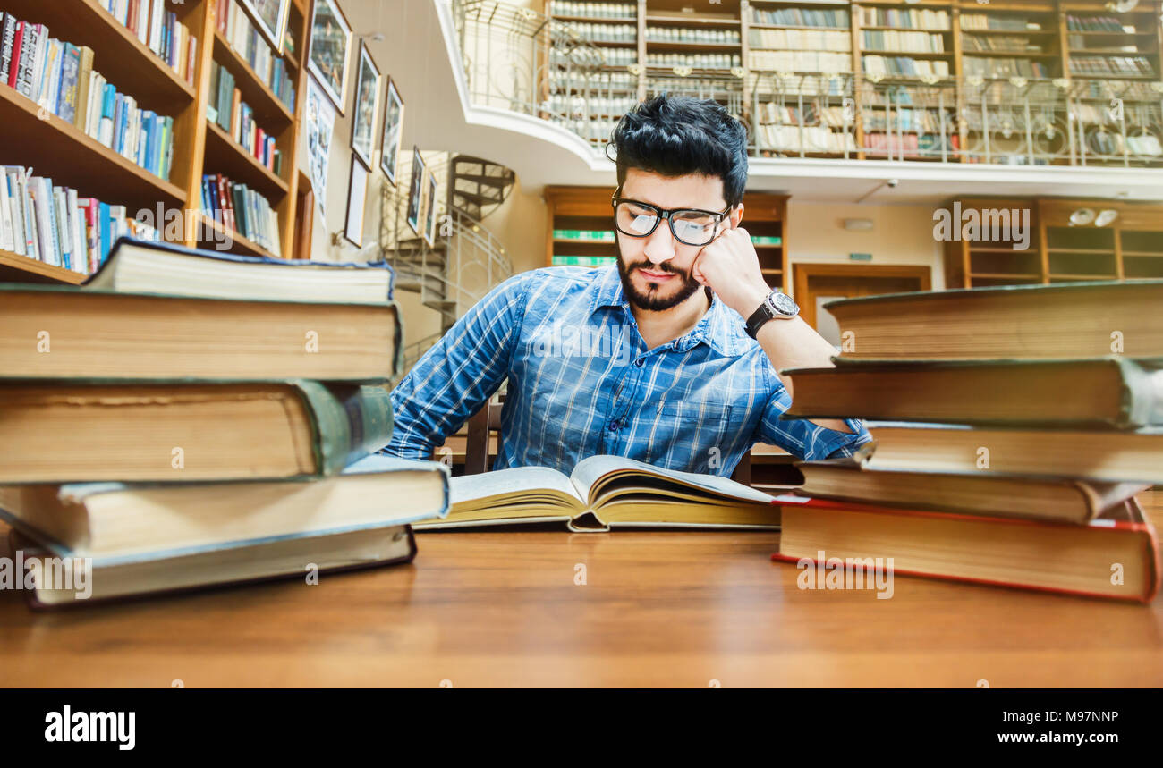 student library man book university Stock Photo - Alamy
