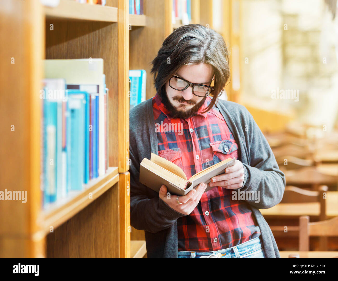 Student Man in the Library Stock Photo - Alamy