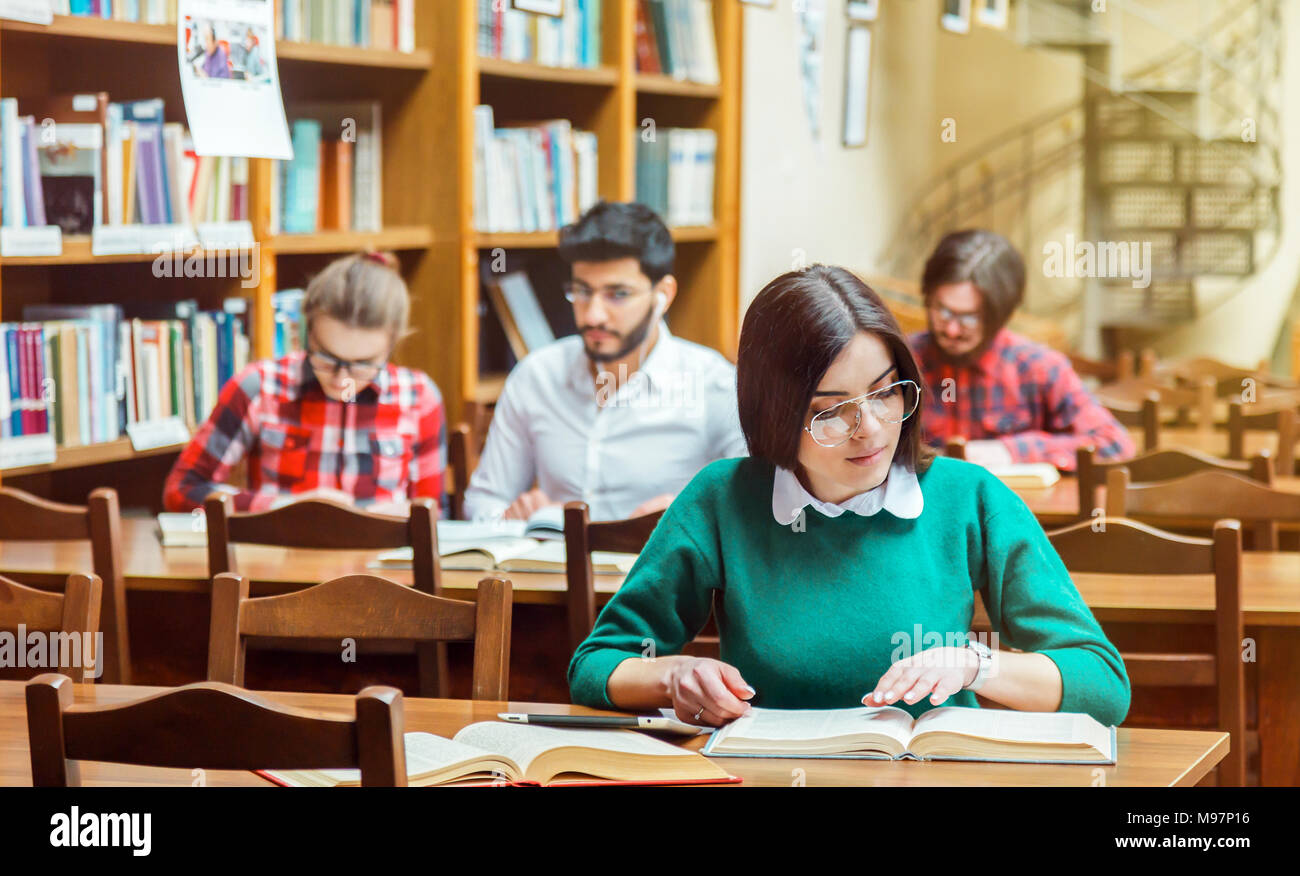 Studying in the Library Stock Photo - Alamy