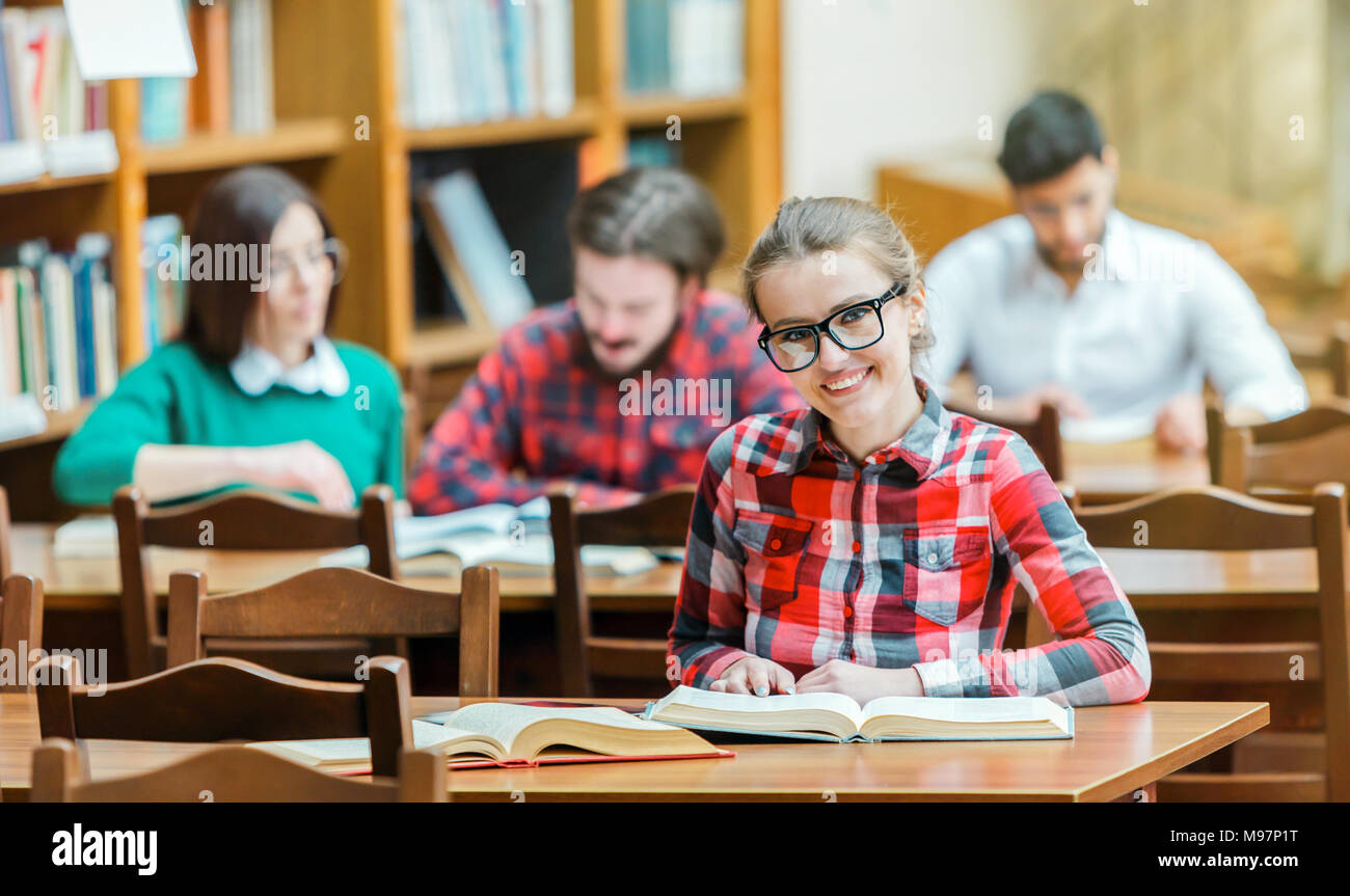 Studying in the Library Stock Photo - Alamy