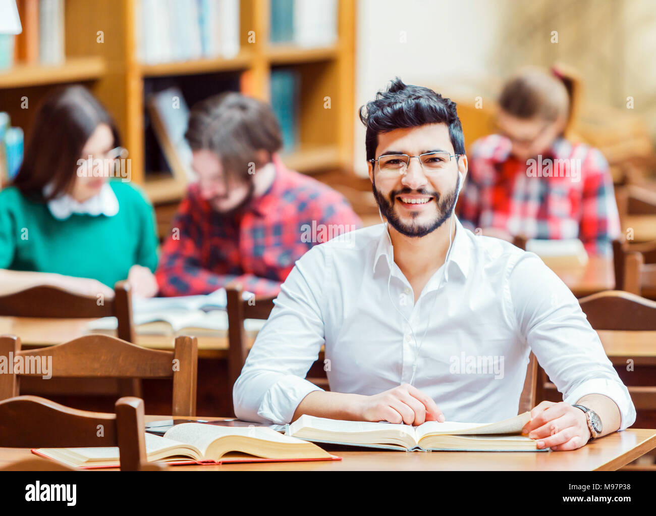 Studying in the Library Stock Photo - Alamy