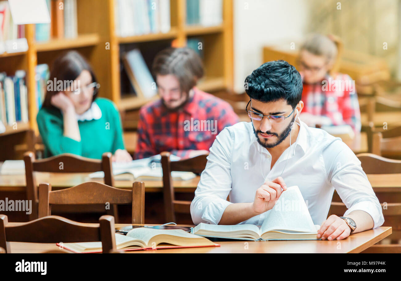 Studying in the Library Stock Photo - Alamy