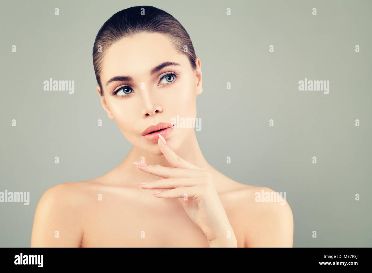 Beautiful Healthy Woman with Perfect Skin Thinking and Looking Up on ...